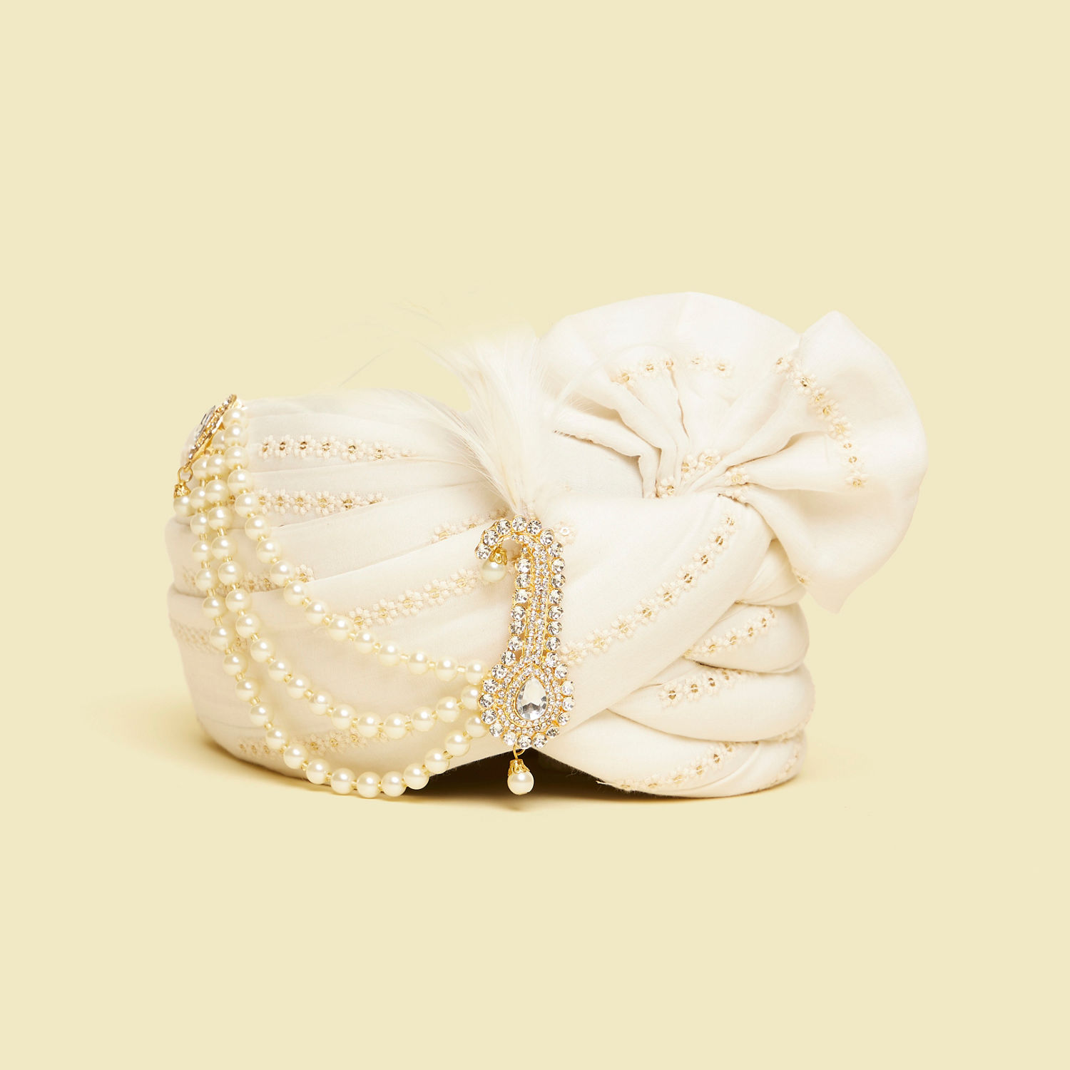 Buy Cream Self Patterned Safa with Peacock Embellished Brooch Online in ...